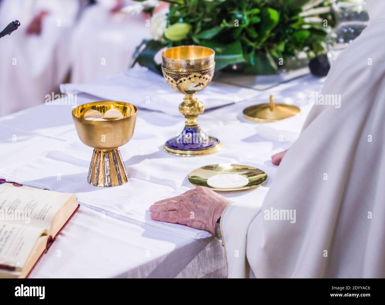altar with consecrated host that becomes the body of jesus christ and ...