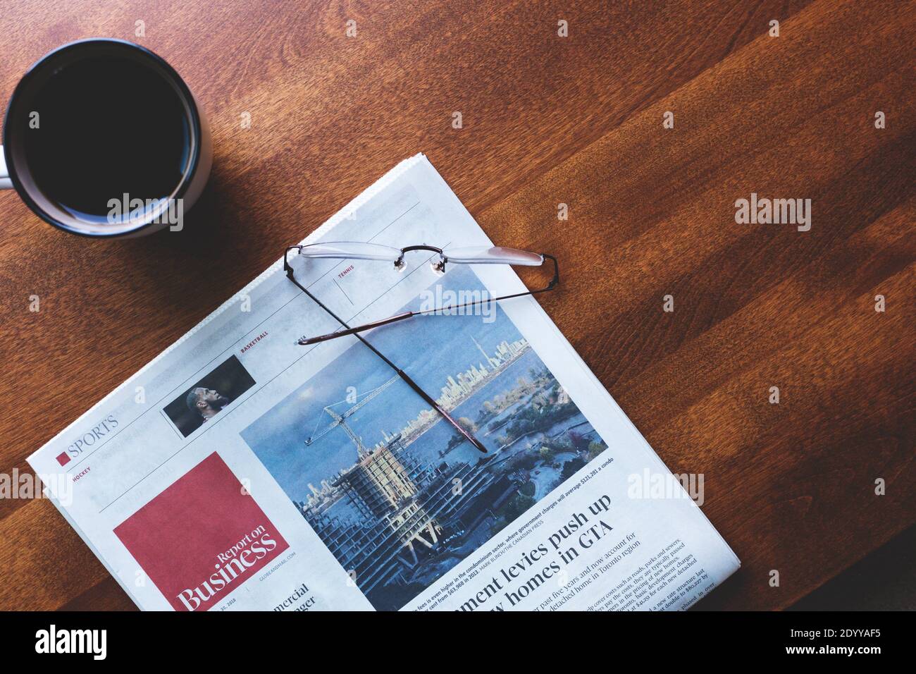 business newspaper coffee time Stock Photo - Alamy