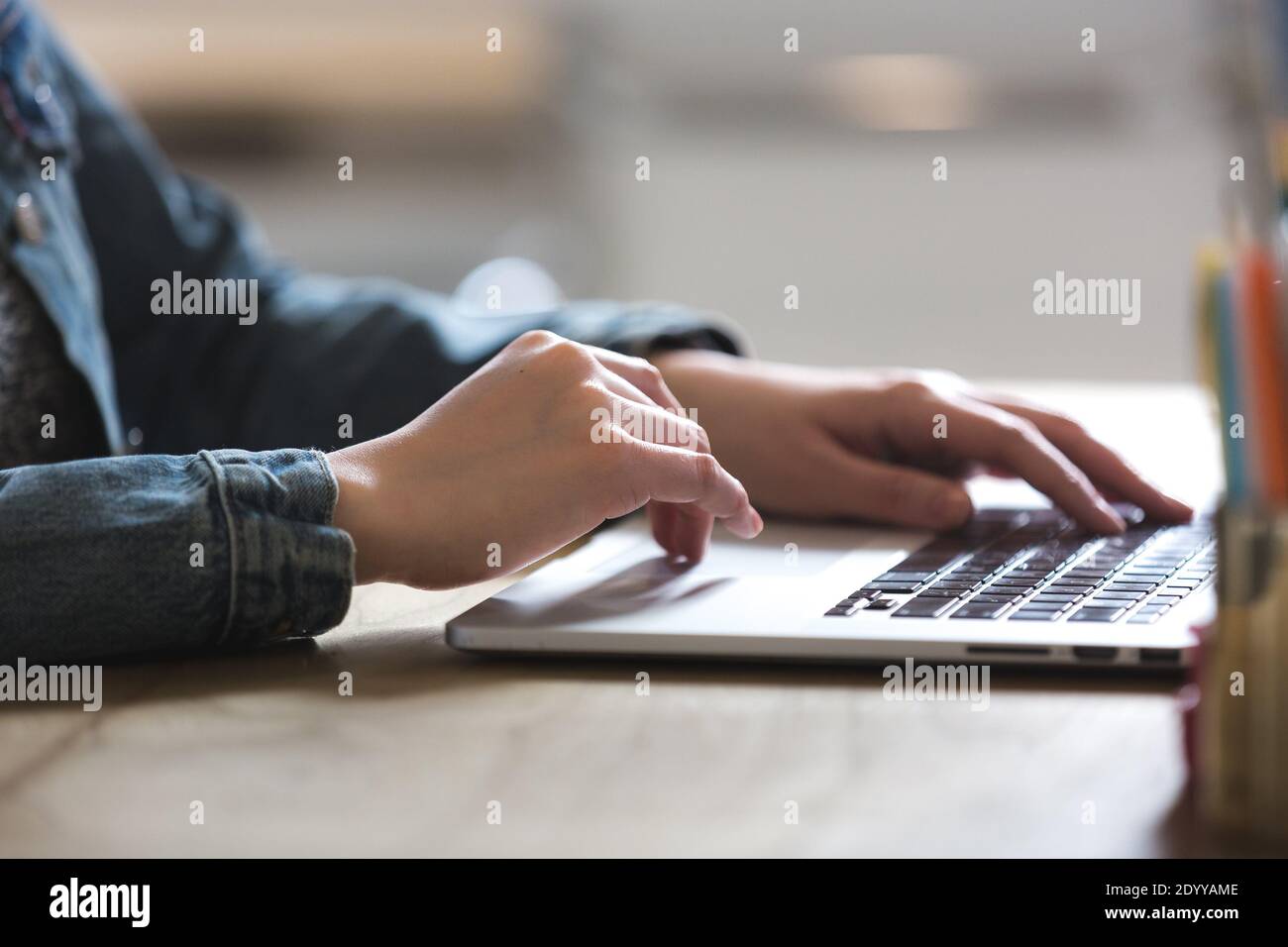 hands on trackpad Stock Photo - Alamy
