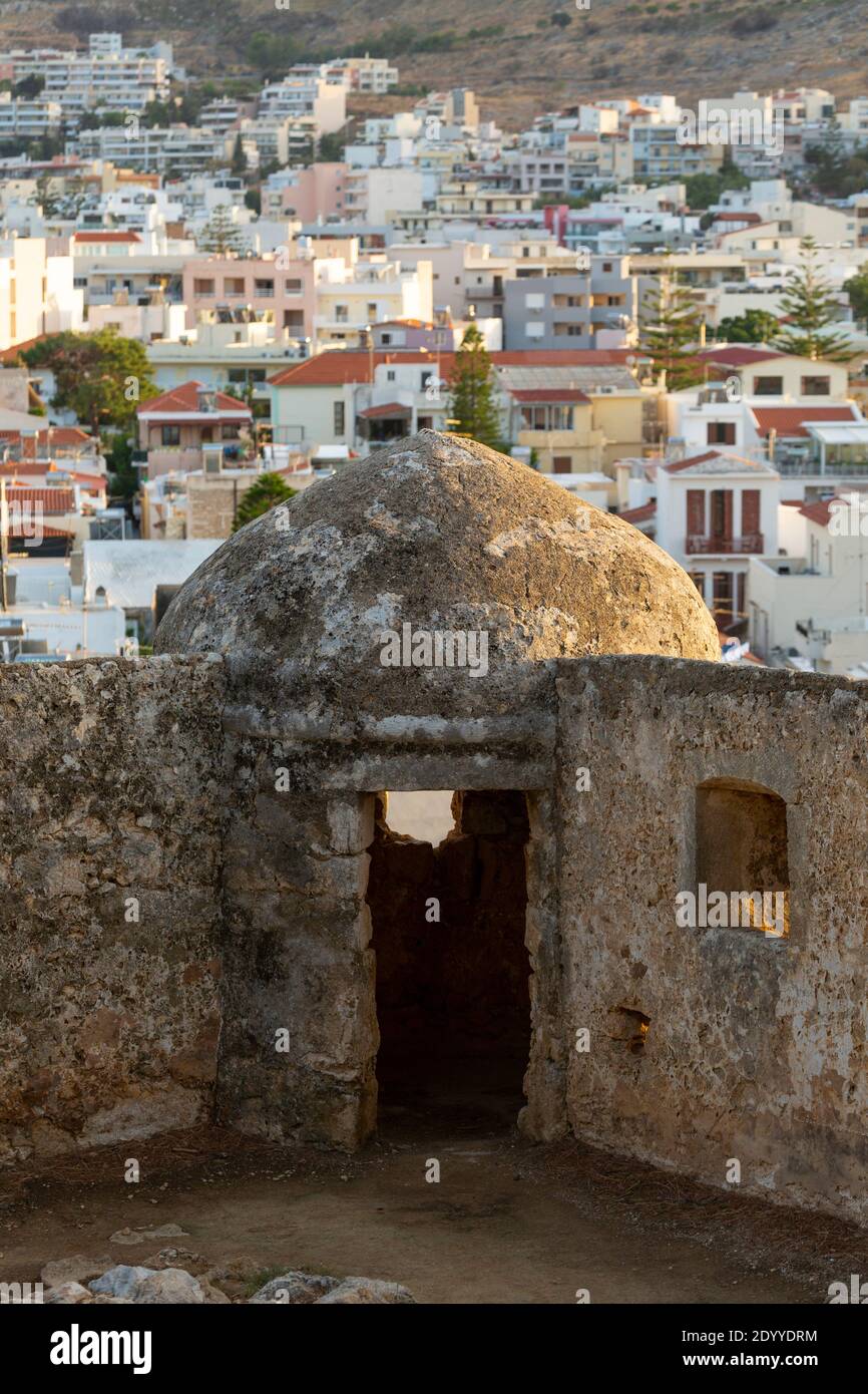Watchtower at Fortezza Castle with cityscape view behind, Rethymno ...