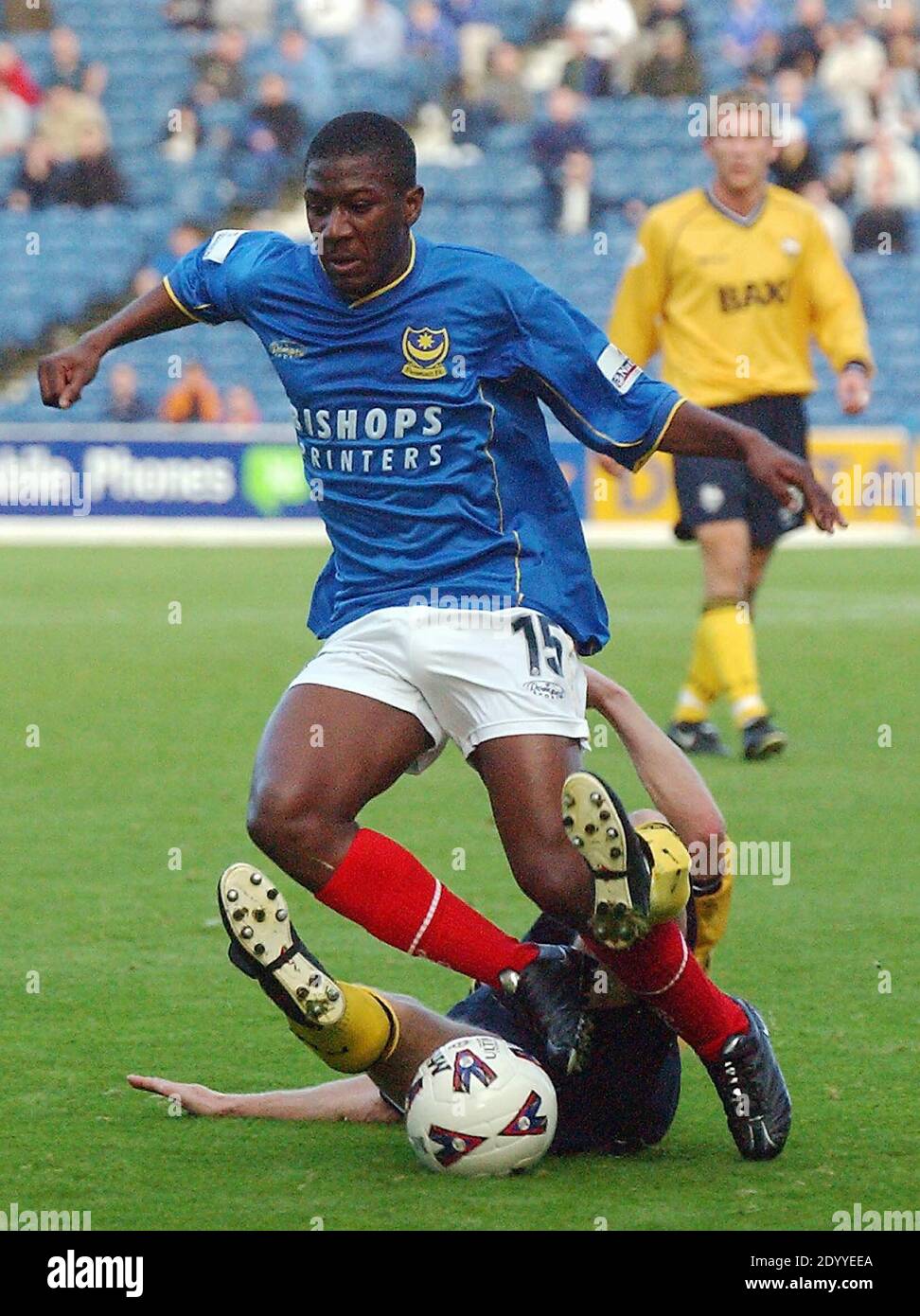 PORTSMOUTH V PRESTON. COURTNEY PITT EVADES A CHALLENGE FROM COLIN ...