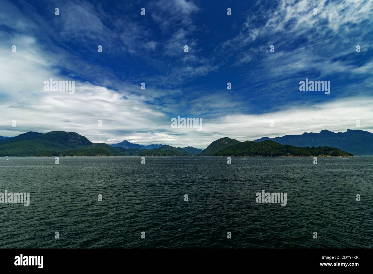 Division between the sky and the water and little land on the Pacific ...