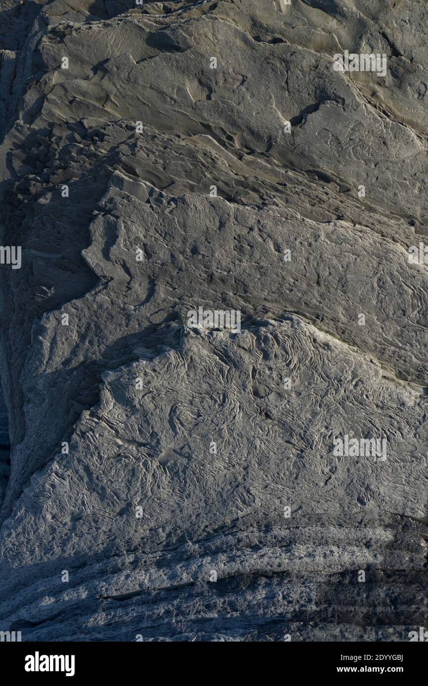 Beach by cliff coastal path with pebbles,rocks and unique stacked ...