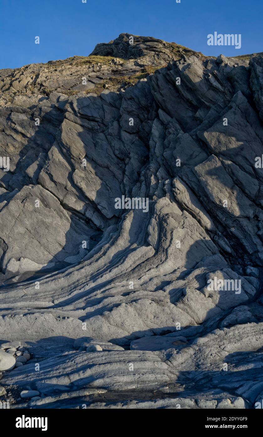 Beach by cliff coastal path with pebbles,rocks and unique stacked ...