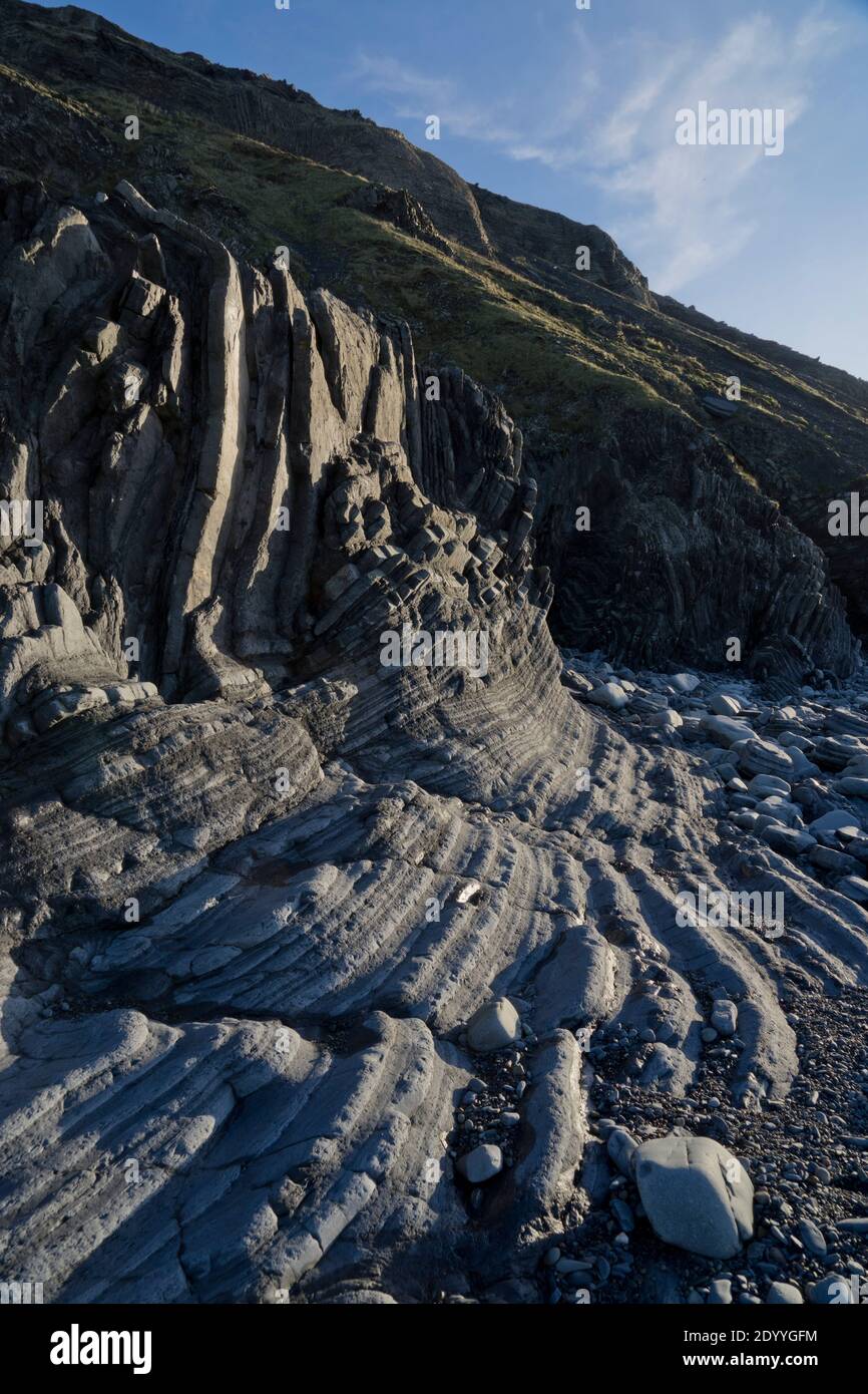 Beach by cliff coastal path with pebbles,rocks and unique stacked ...