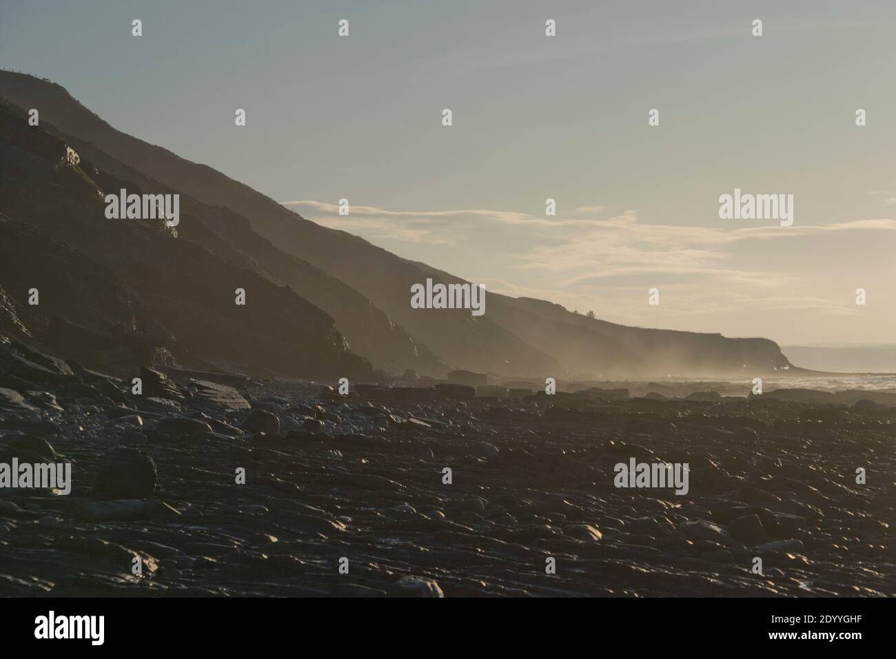 Beach by cliff coastal path with pebbles,rocks and unique stacked ...