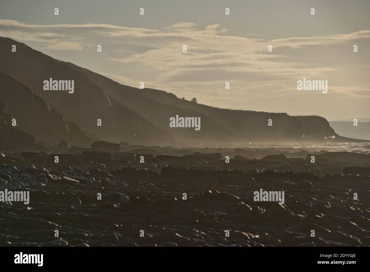 Beach by cliff coastal path with pebbles,rocks and unique stacked ...