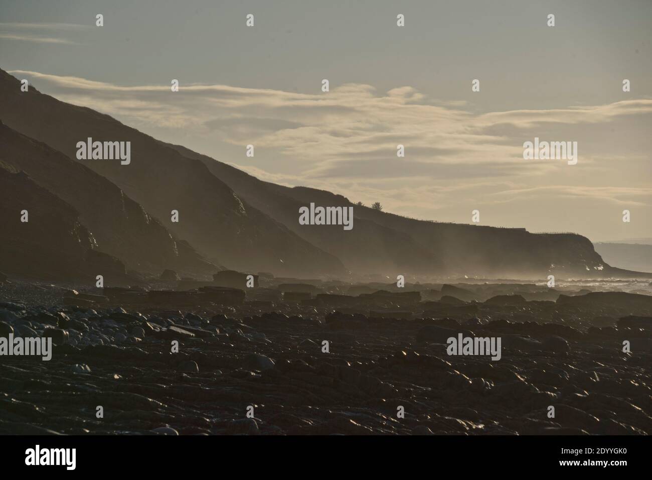 Beach by cliff coastal path with pebbles,rocks and unique stacked ...