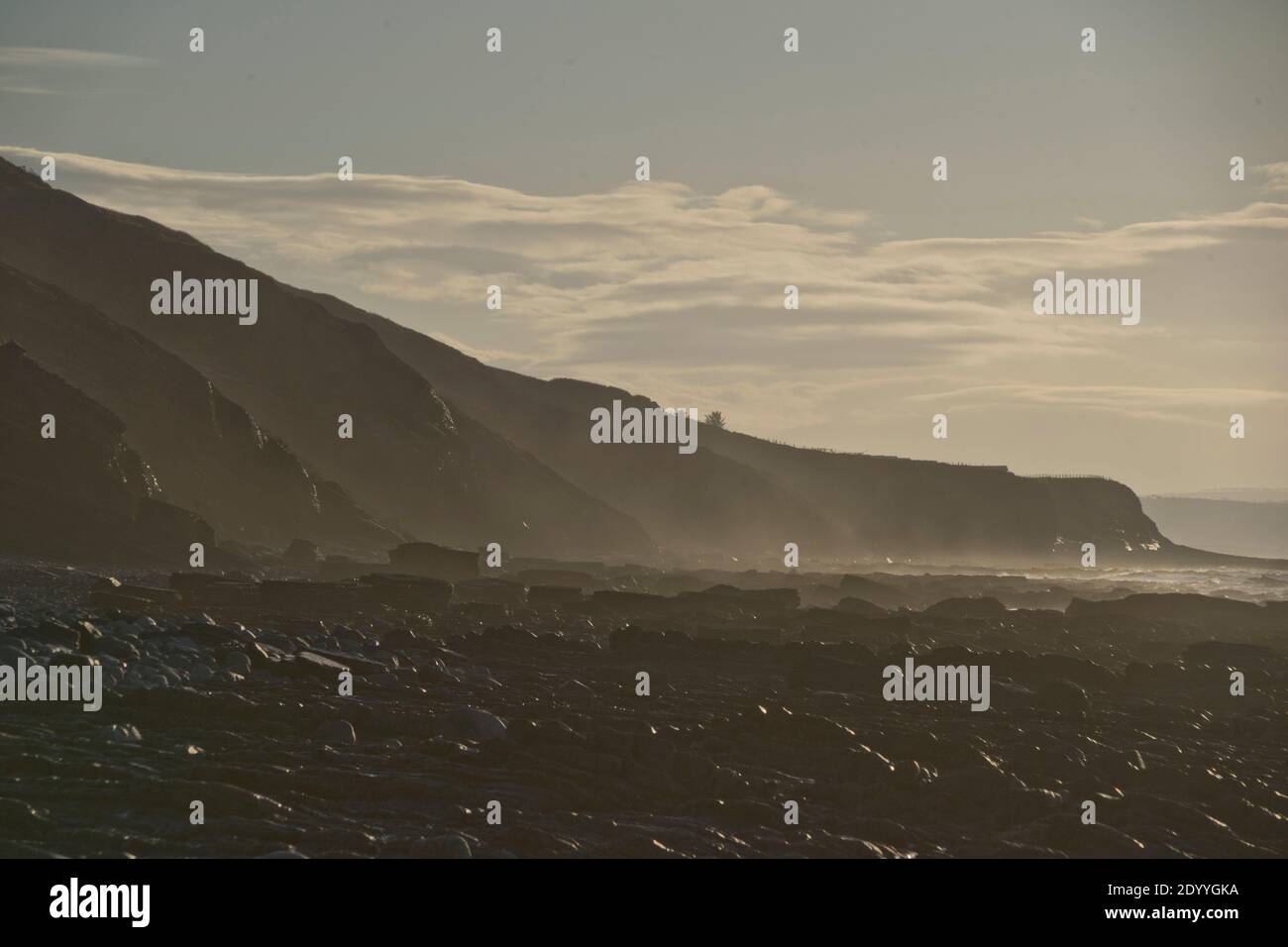 Beach by cliff coastal path with pebbles,rocks and unique stacked ...
