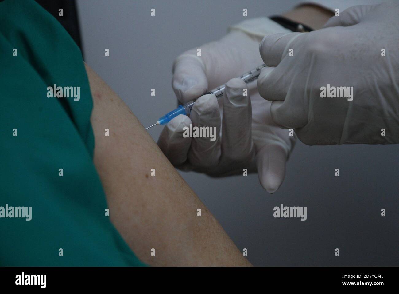 Greek nurse working in a state hospital intensive care unit, receives ...