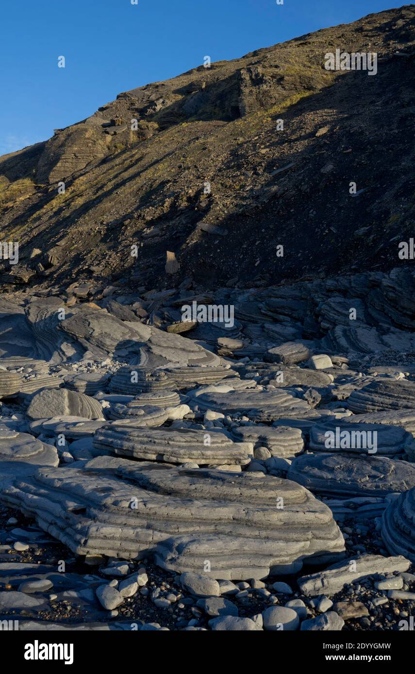 Beach by cliff coastal path with pebbles,rocks and unique stacked ...
