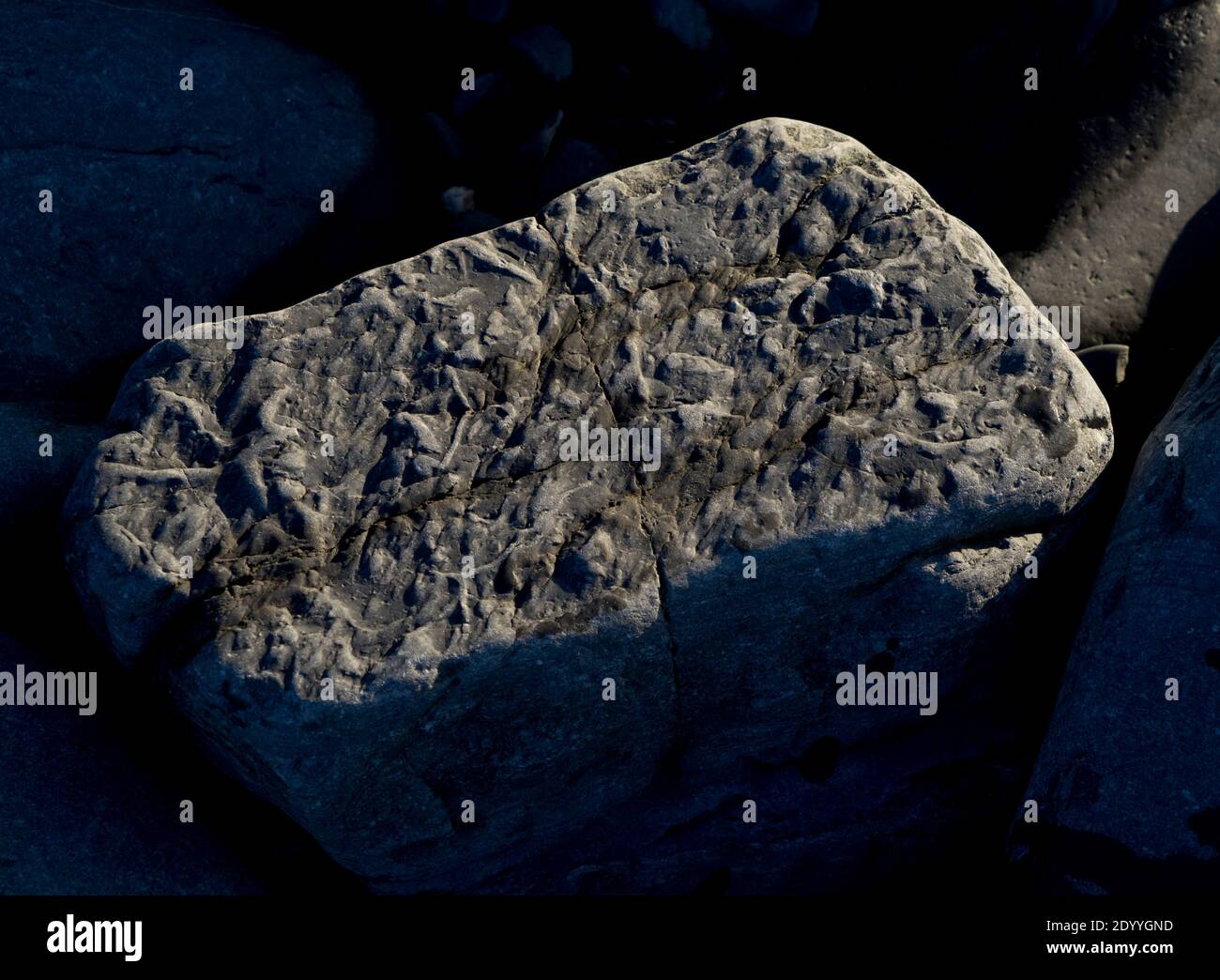 Beach by cliff coastal path with pebbles,rocks and unique stacked ...