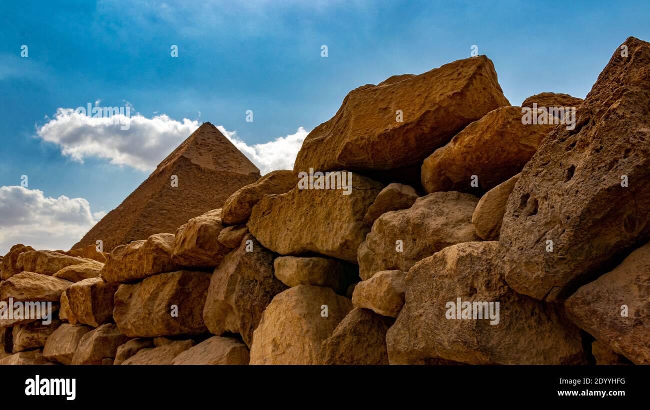 A Pyramid behind an old stone wall near Giza, Egypt Stock Photo - Alamy
