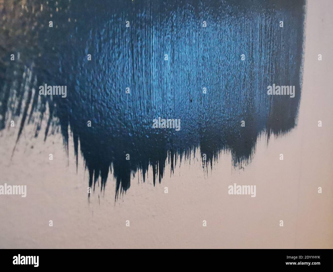 Blue paint streaks on a white interior wall Stock Photo - Alamy