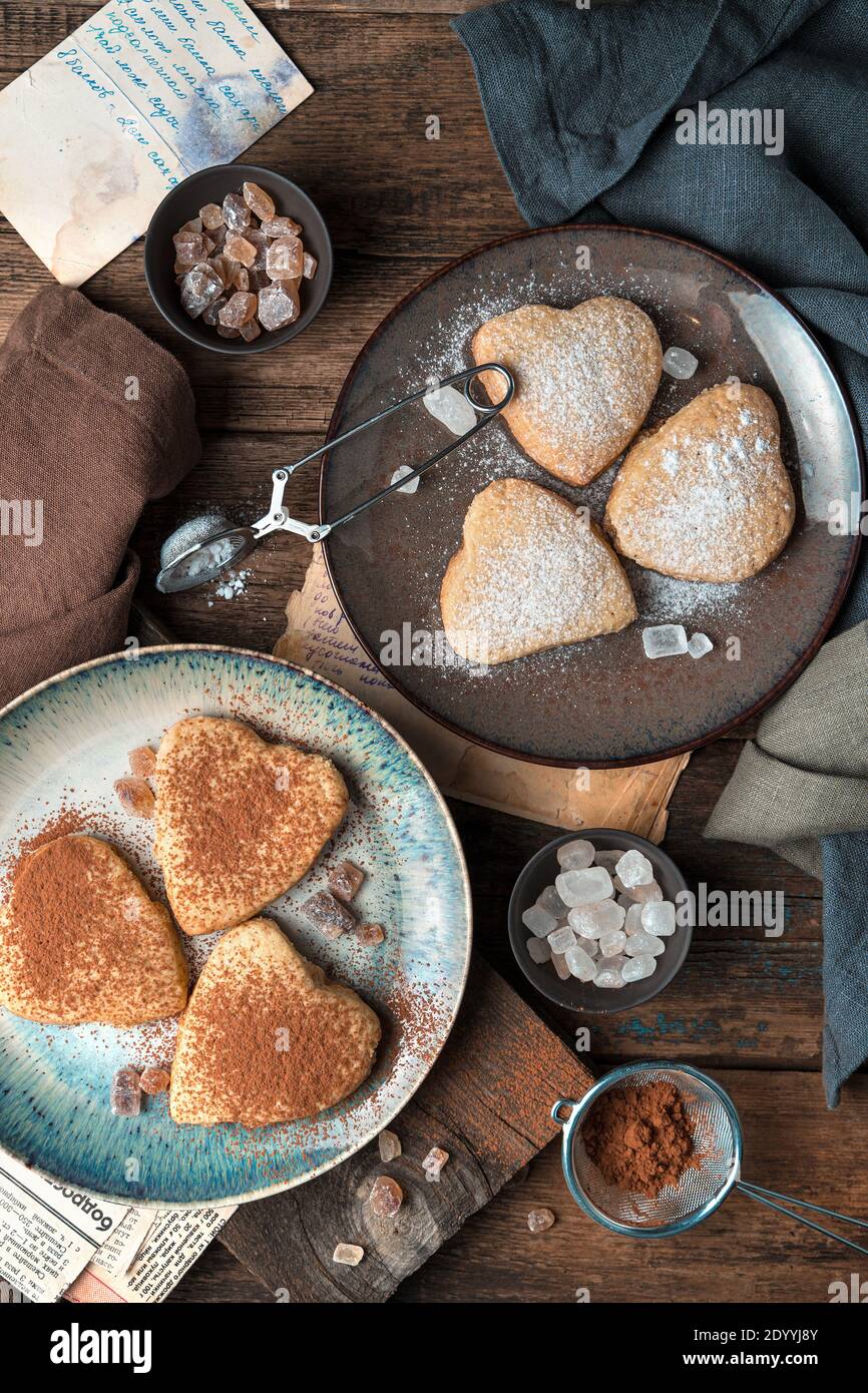 Shortbread cookies of two types on a vintage background. The view from ...
