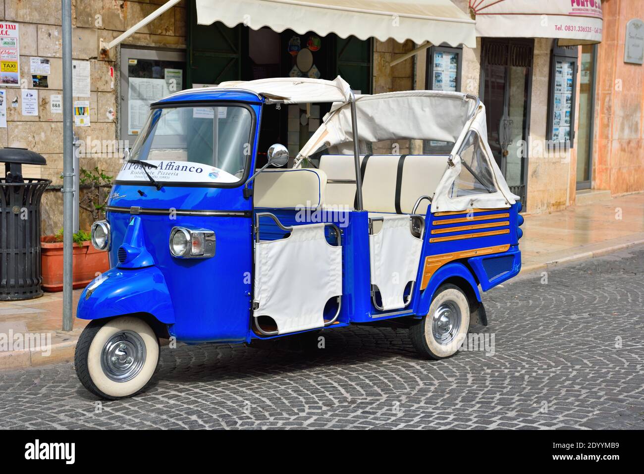 three-wheeled motorcycle for transporting tourists in the village- May ...