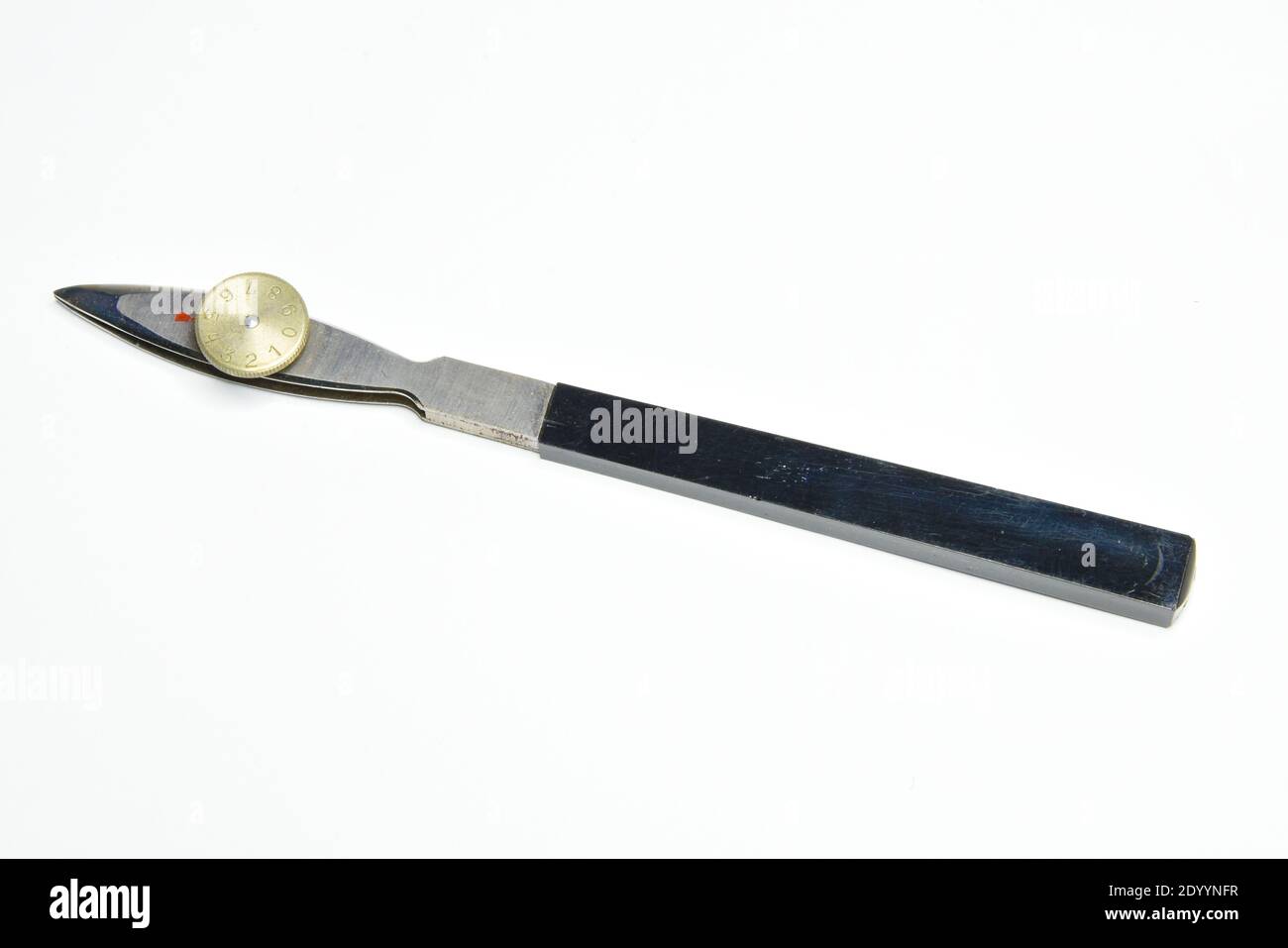 Metal Technical drawing instrument on gray background Stock Photo - Alamy