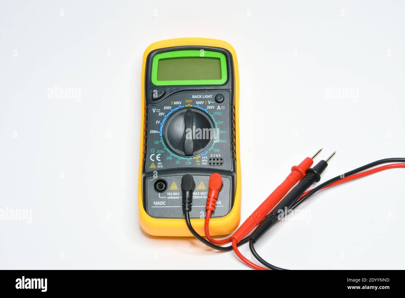 Digital electronic measuring instrument with black and red cables ...