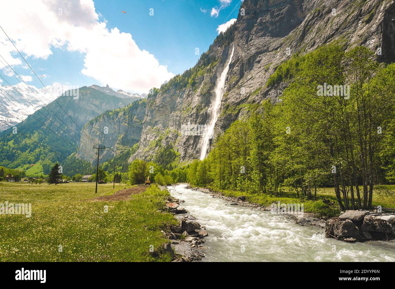 Beautiful Swiss Alps Valley With Waterfall and a River Stock Photo - Alamy