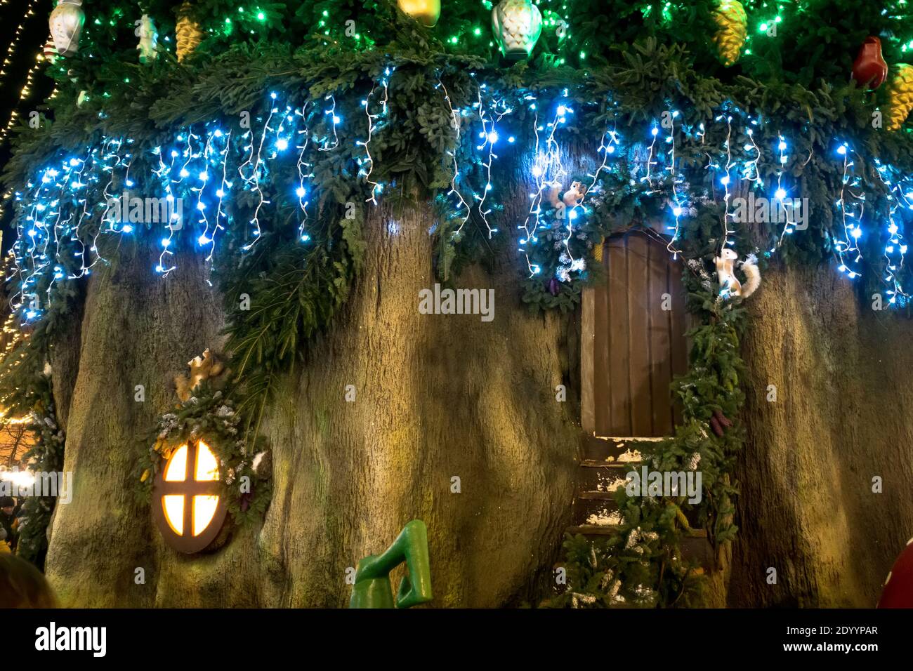 Magic gnome house in a tree trunk Stock Photo - Alamy