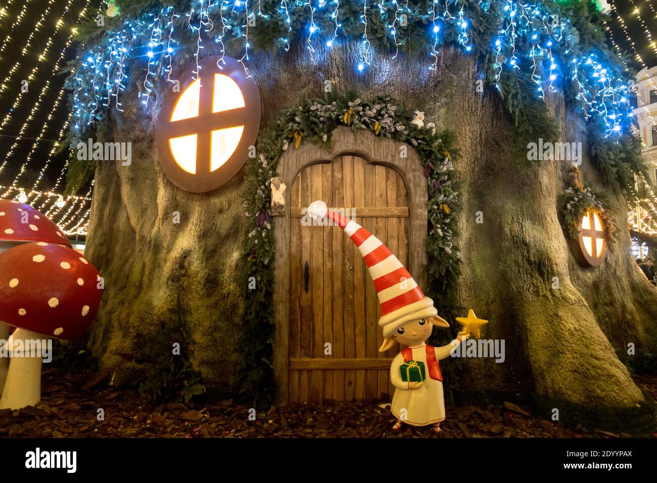 Magic gnome house in a tree trunk Stock Photo - Alamy