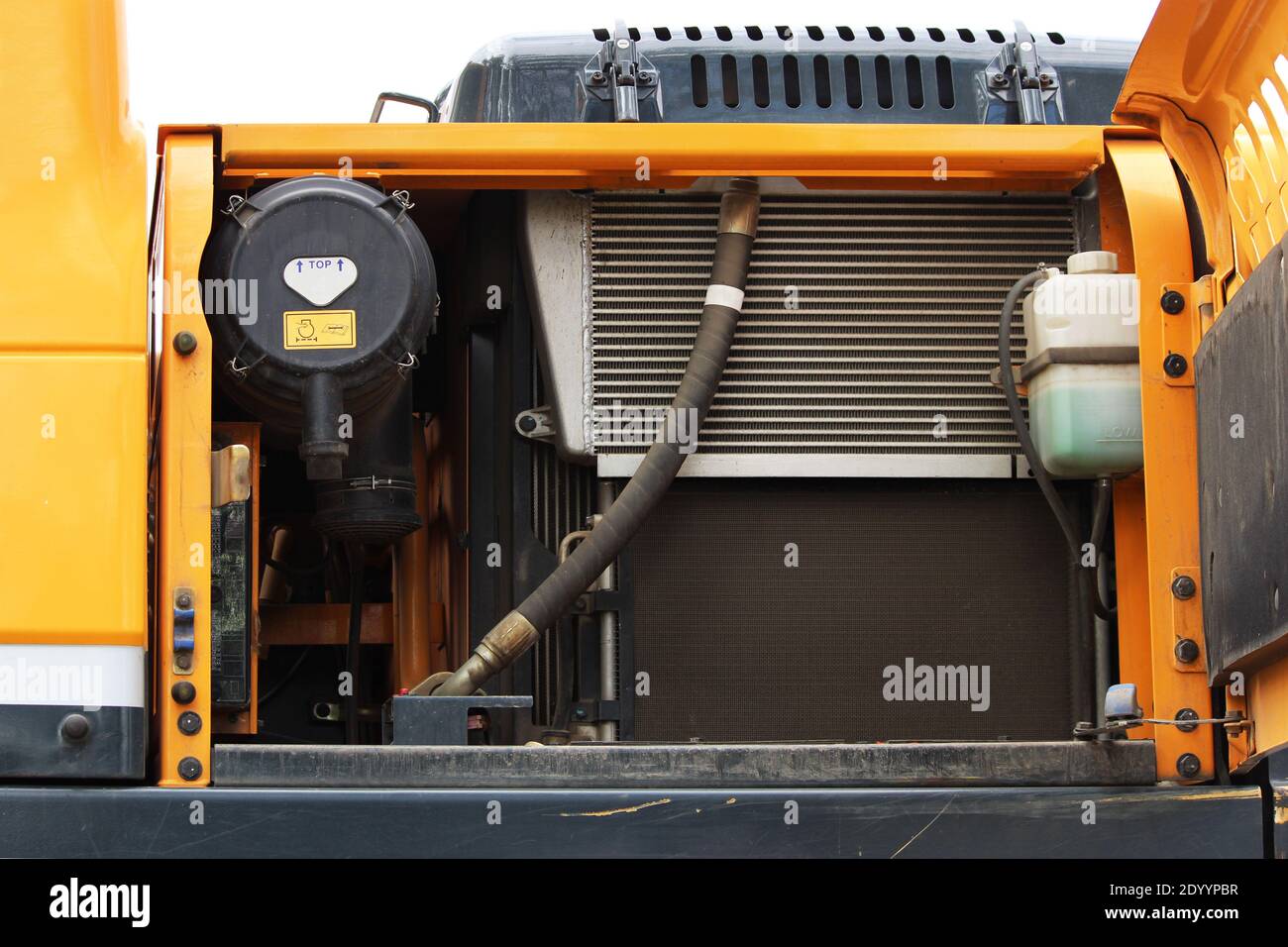 internal structure of the excavator. a construction team is repairing a ...
