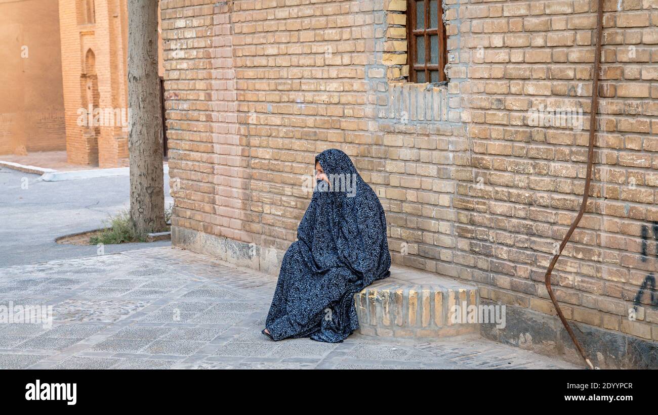 Shiraz, Iran - May 2019: Iranian woman fully covered in her burqa ...