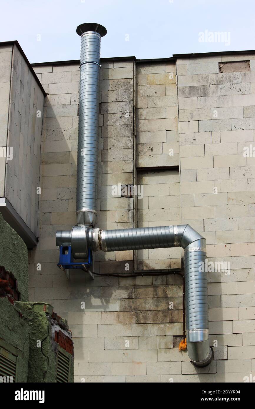 metal pipe for supply and exhaust ventilation goes outside the house ...