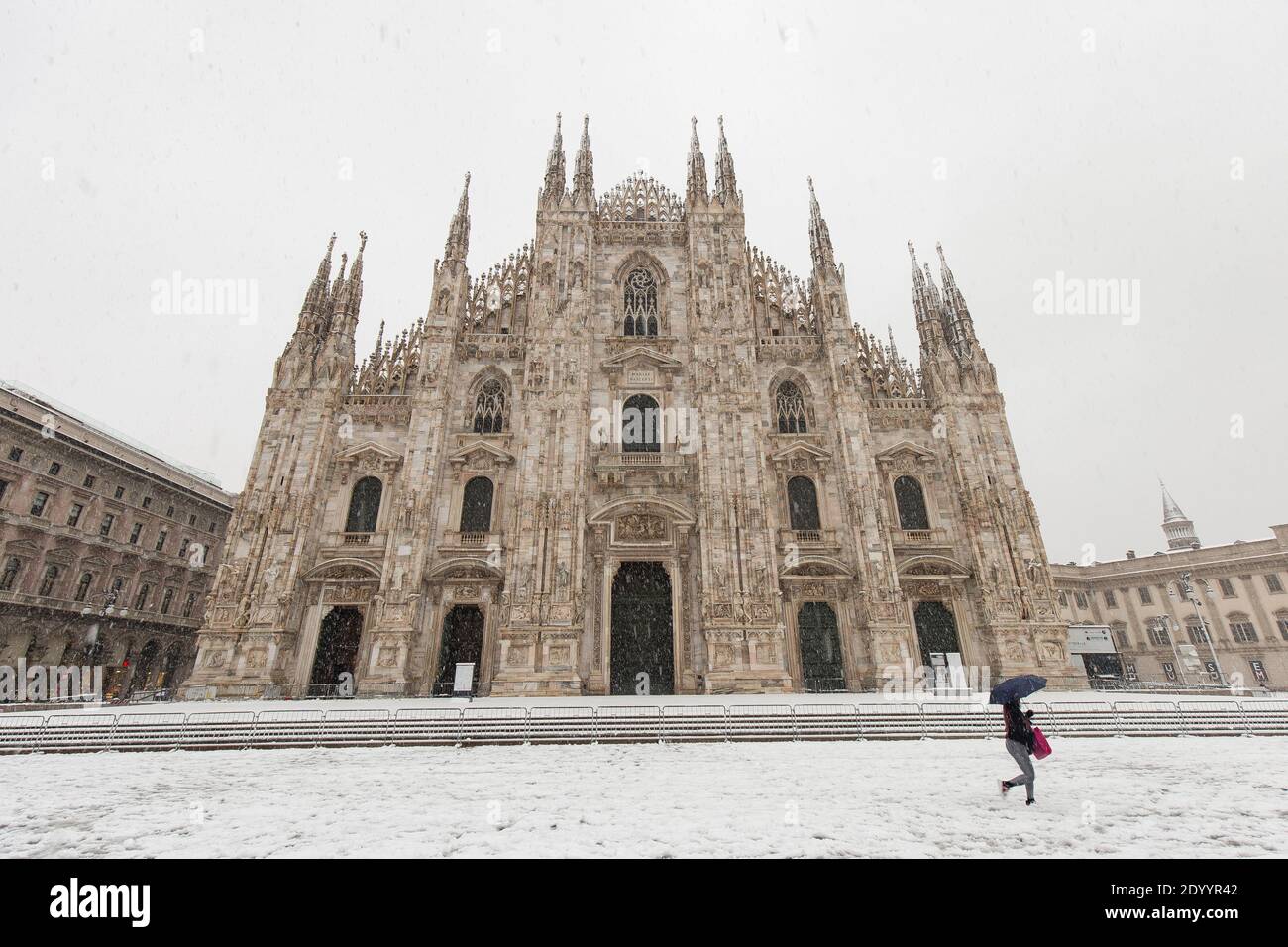 Milan, Italy - December 28, 2020: street view of Milan during the snow ...