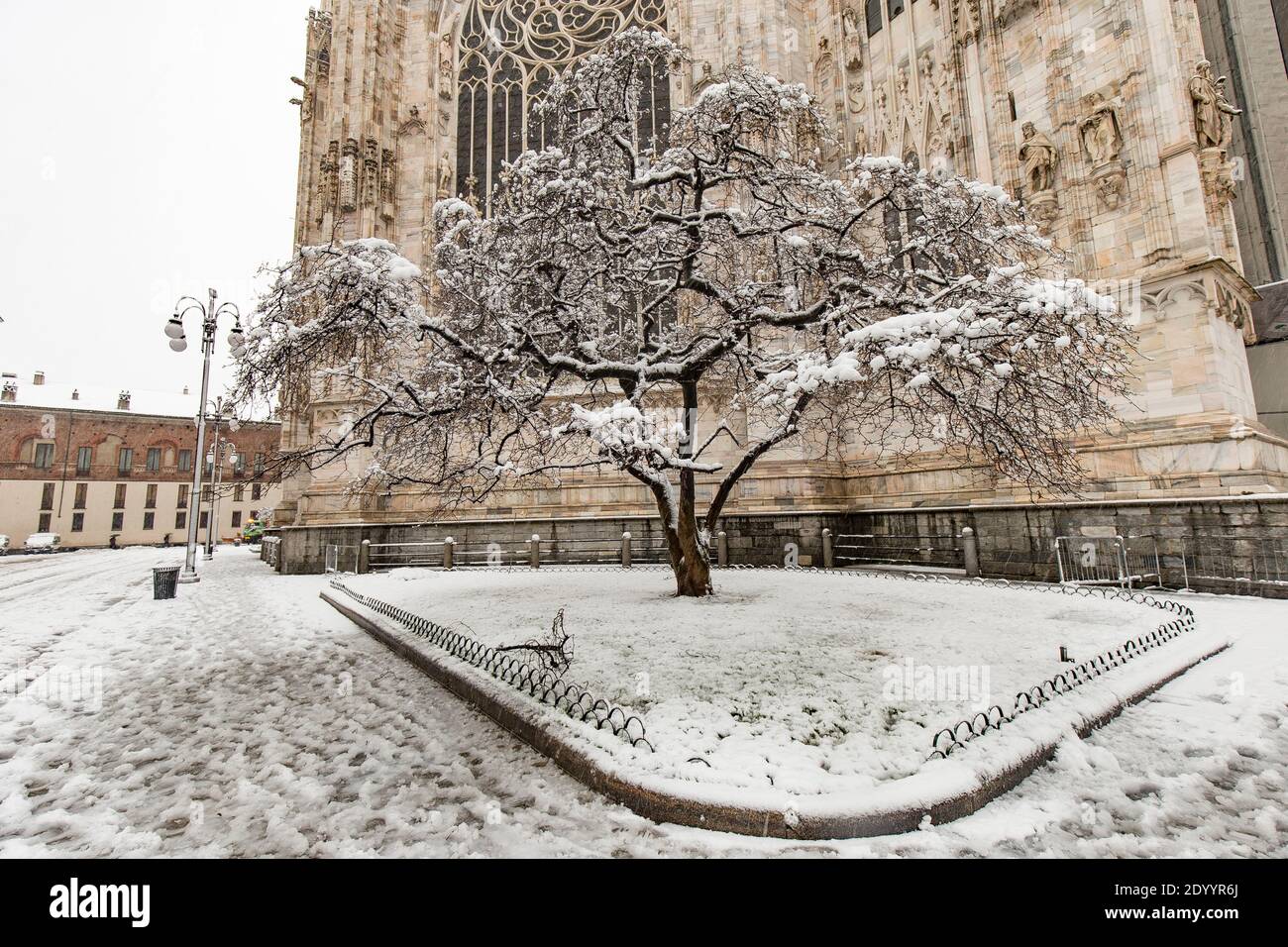 Milan, Italy - December 28, 2020: street view of Milan during the snow ...