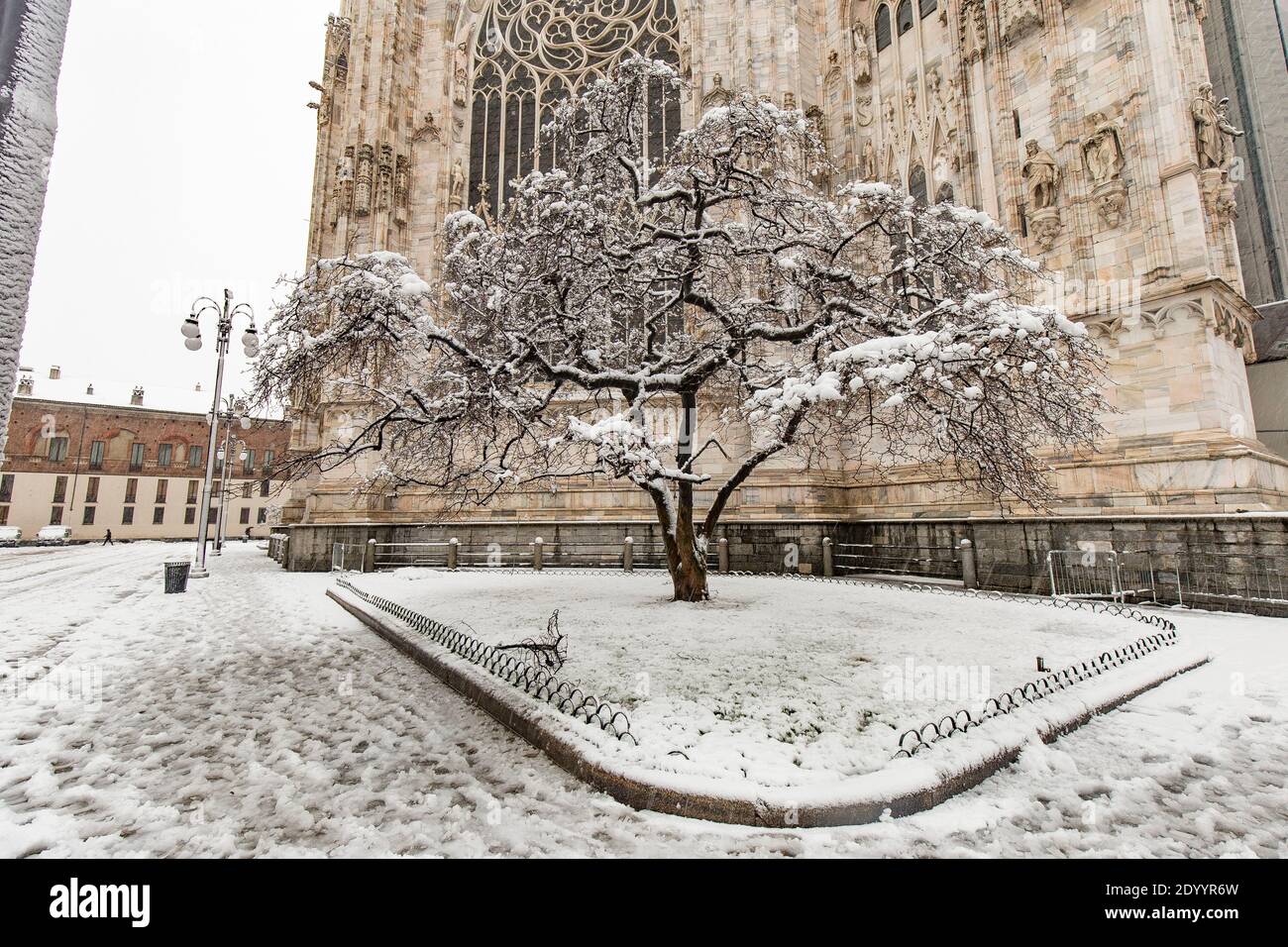 Milan, Italy - December 28, 2020: street view of Milan during the snow ...