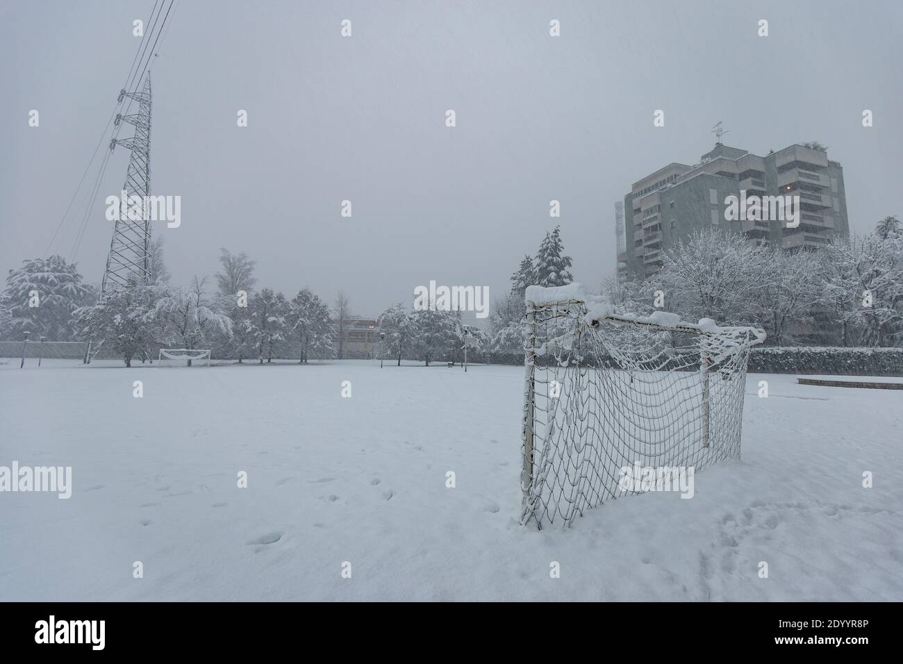 Milan, Italy - December 28, 2020: street view of Milan during the snow ...