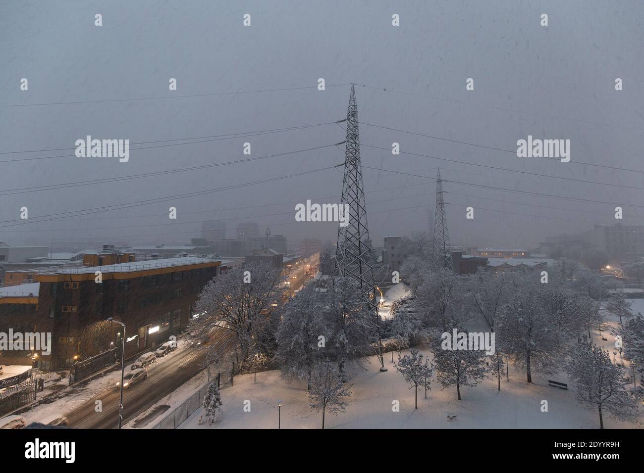 Milan, Italy - December 28, 2020: street view of Milan during the snow ...