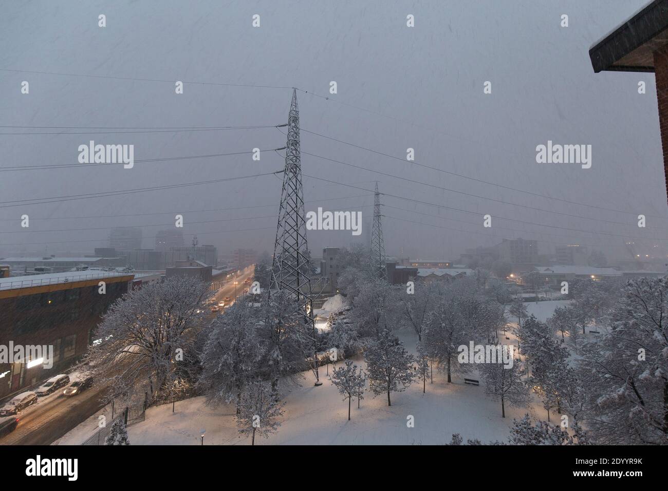 Milan, Italy - December 28, 2020: street view of Milan during the snow ...