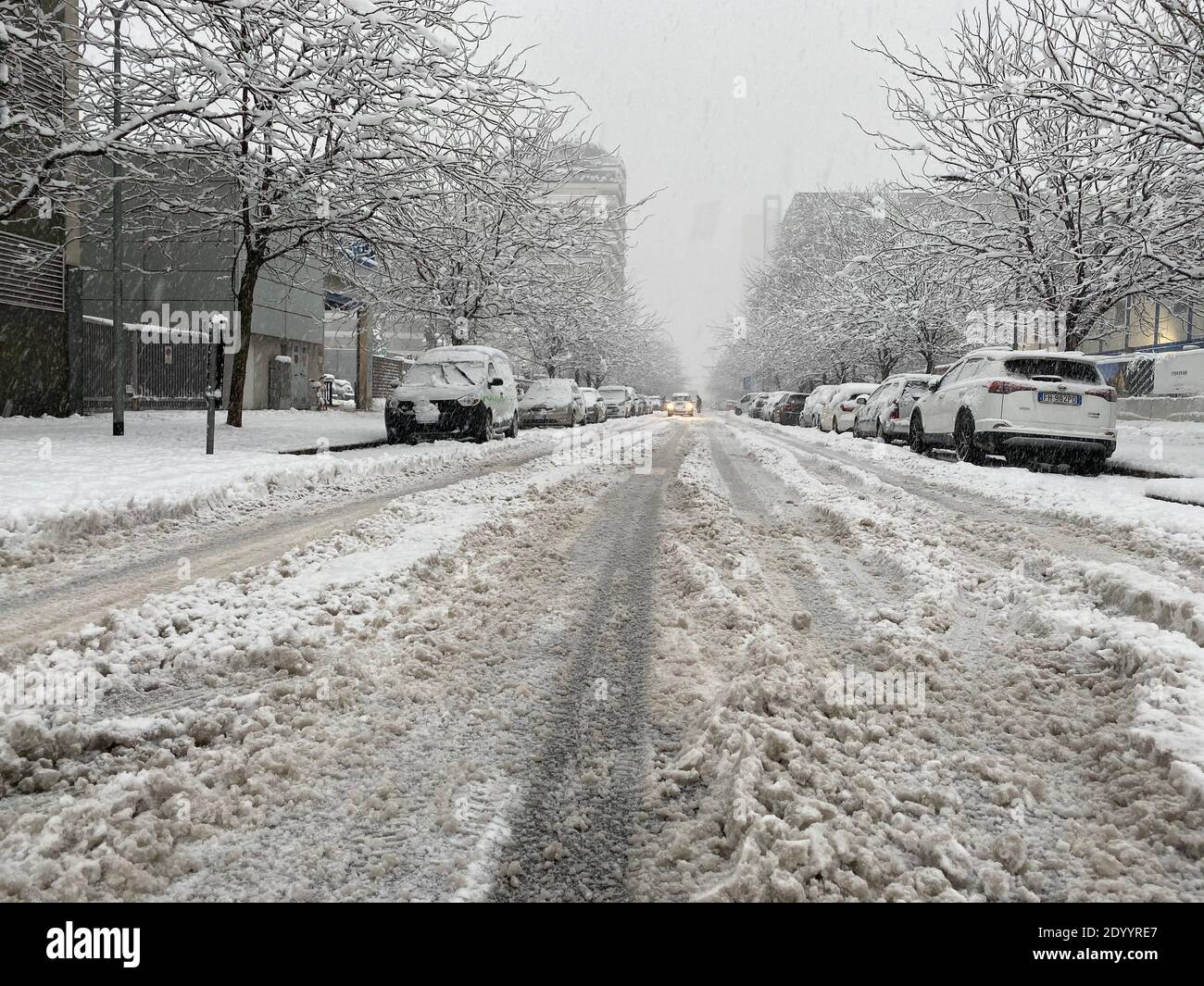 Milan, Italy - December 28, 2020: street view of Milan during the snow ...