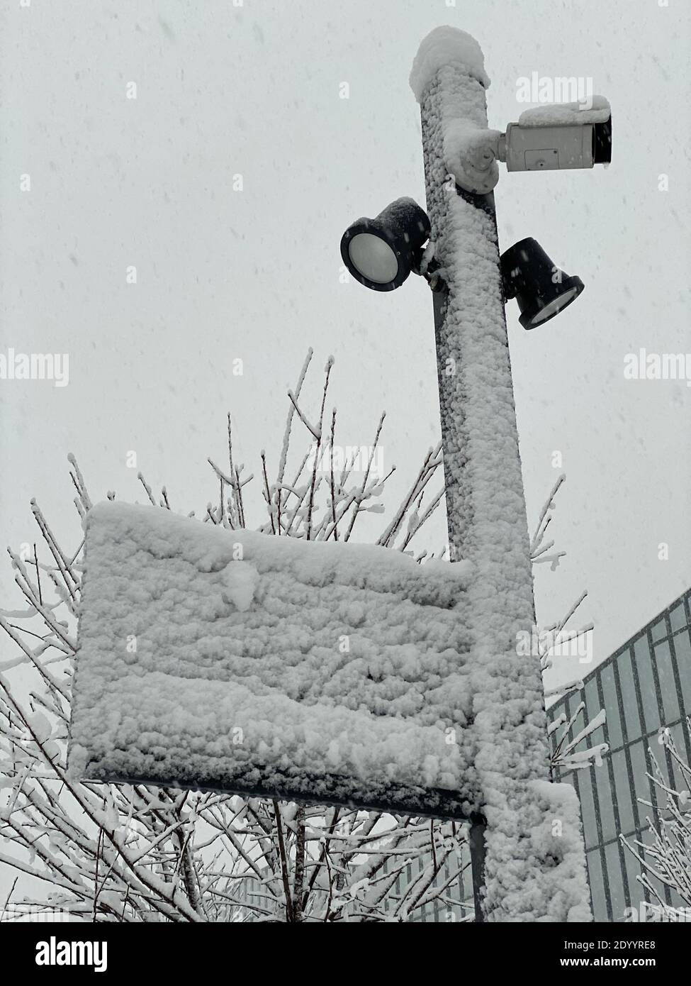 Milan, Italy - December 28, 2020: street view of Milan during the snow ...