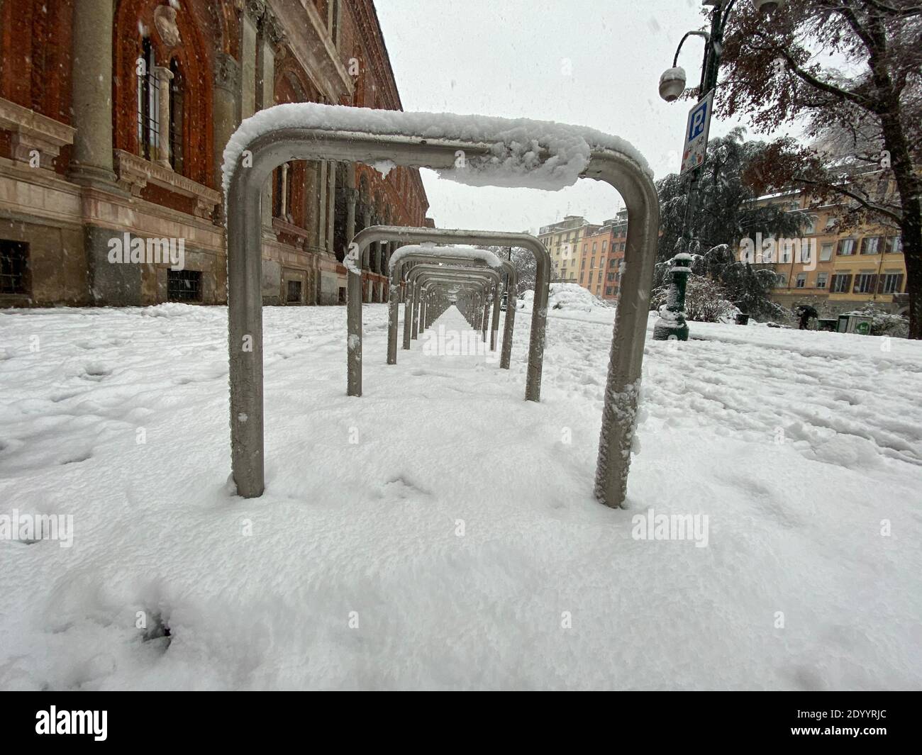 Milan, Italy - December 28, 2020: street view of Milan during the snow ...