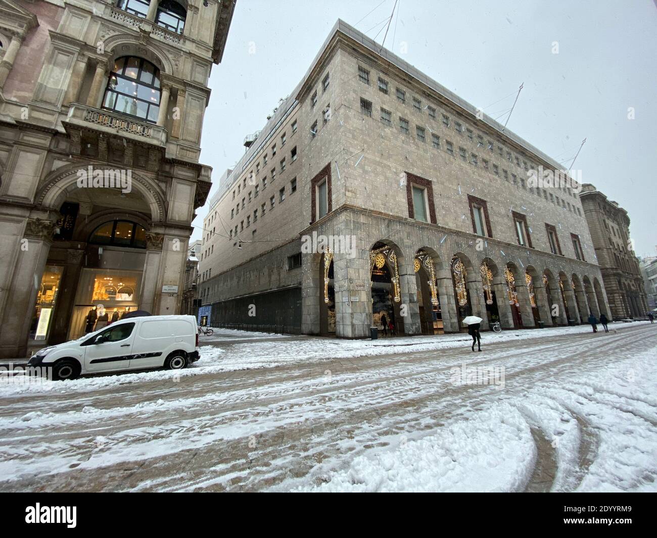 Milan, Italy - December 28, 2020: street view of Milan during the snow ...
