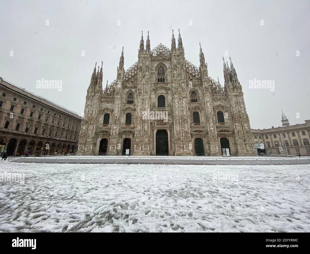 Milan, Italy - December 28, 2020: street view of Milan during the snow ...