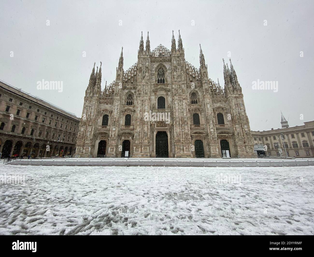 Milan, Italy - December 28, 2020: street view of Milan during the snow ...