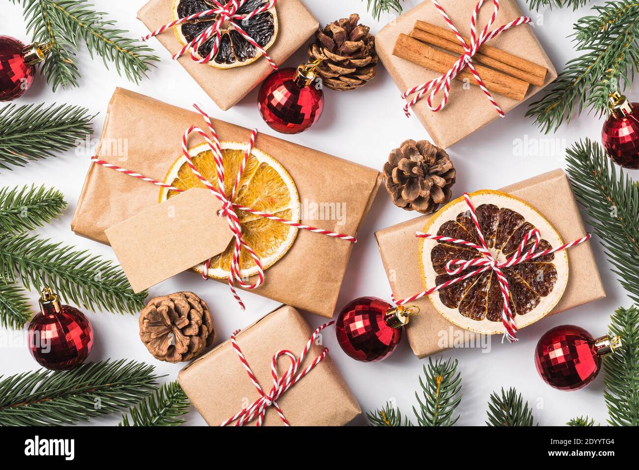 Christmas holidays zero waste paper gifts wrapping with tag, baubles ...
