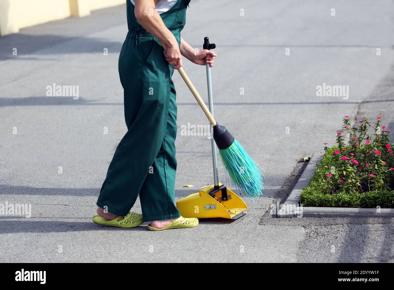 Employee sweeping street hi-res stock photography and images - Alamy