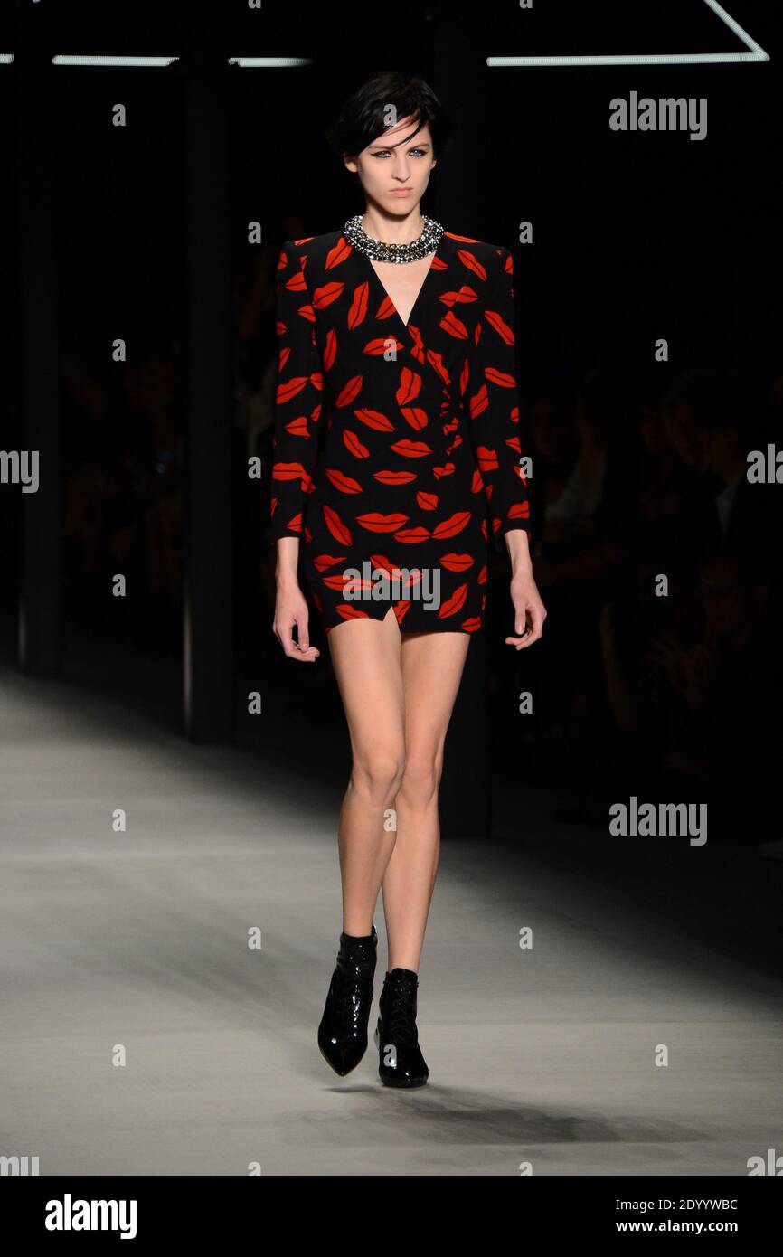 A model displays a creation by designer Hedi Slimane for Saint-Laurent ...