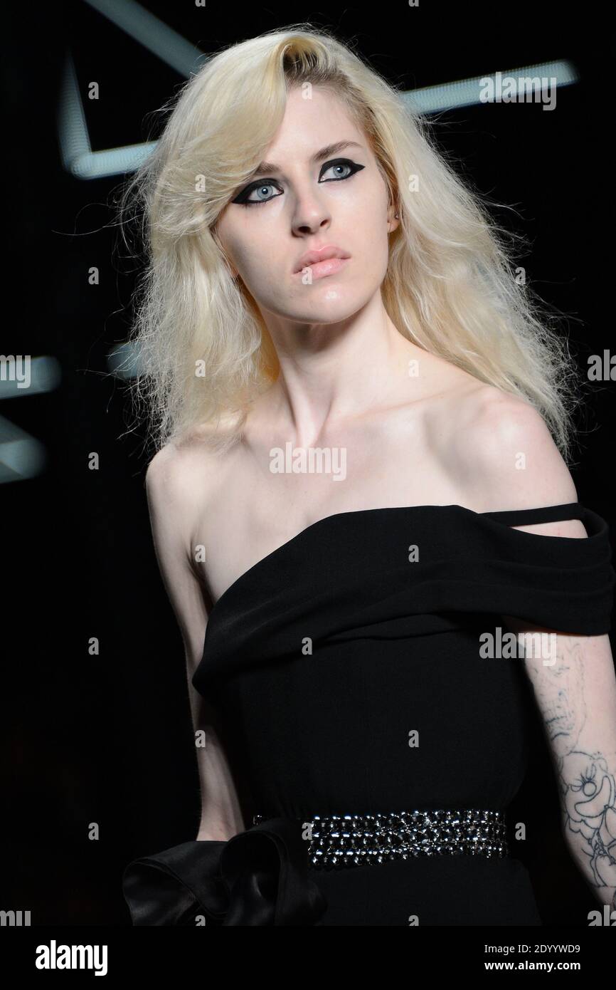 A model displays a creation by designer Hedi Slimane for Saint-Laurent ...