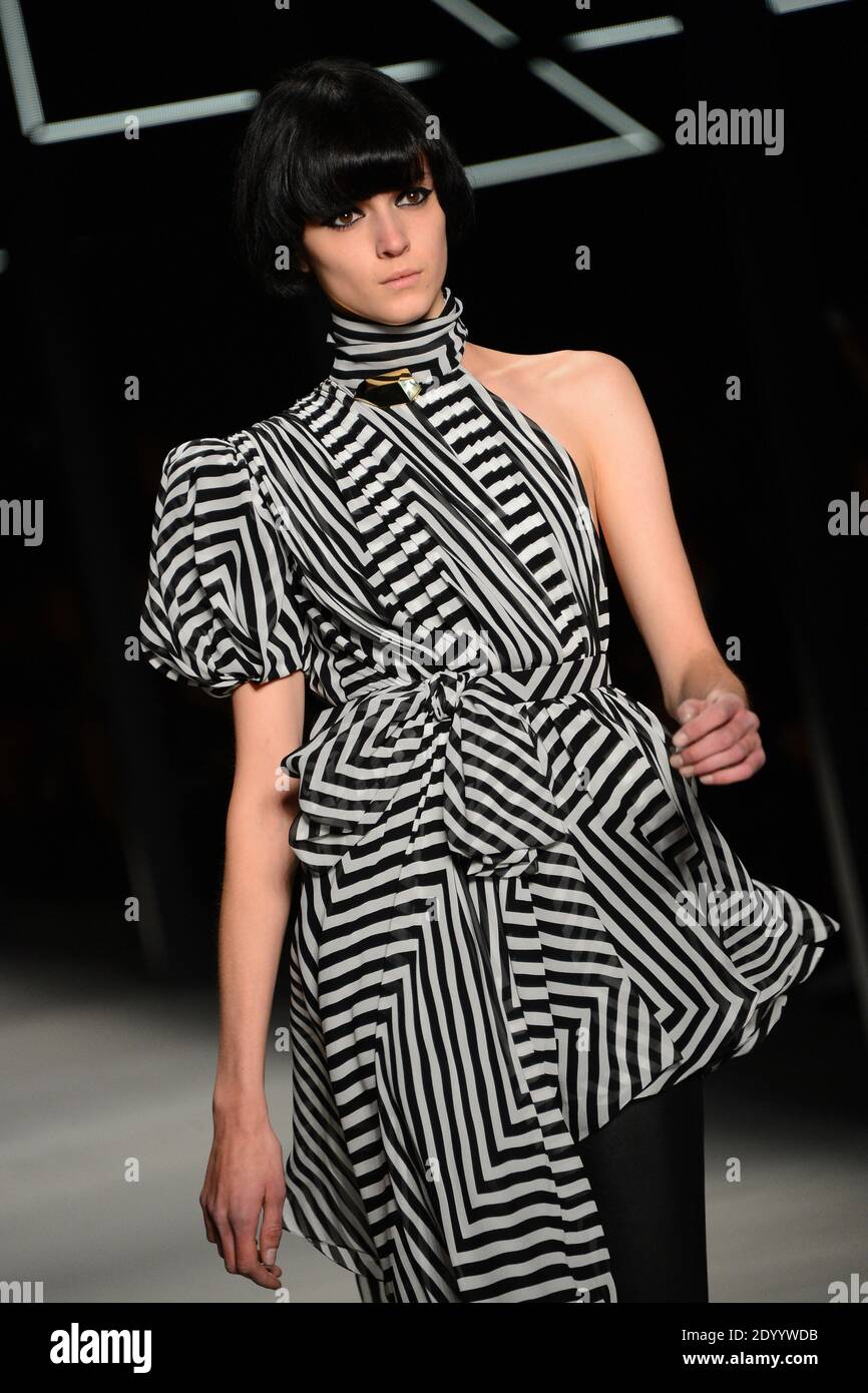 A model displays a creation by designer Hedi Slimane for Saint-Laurent ...