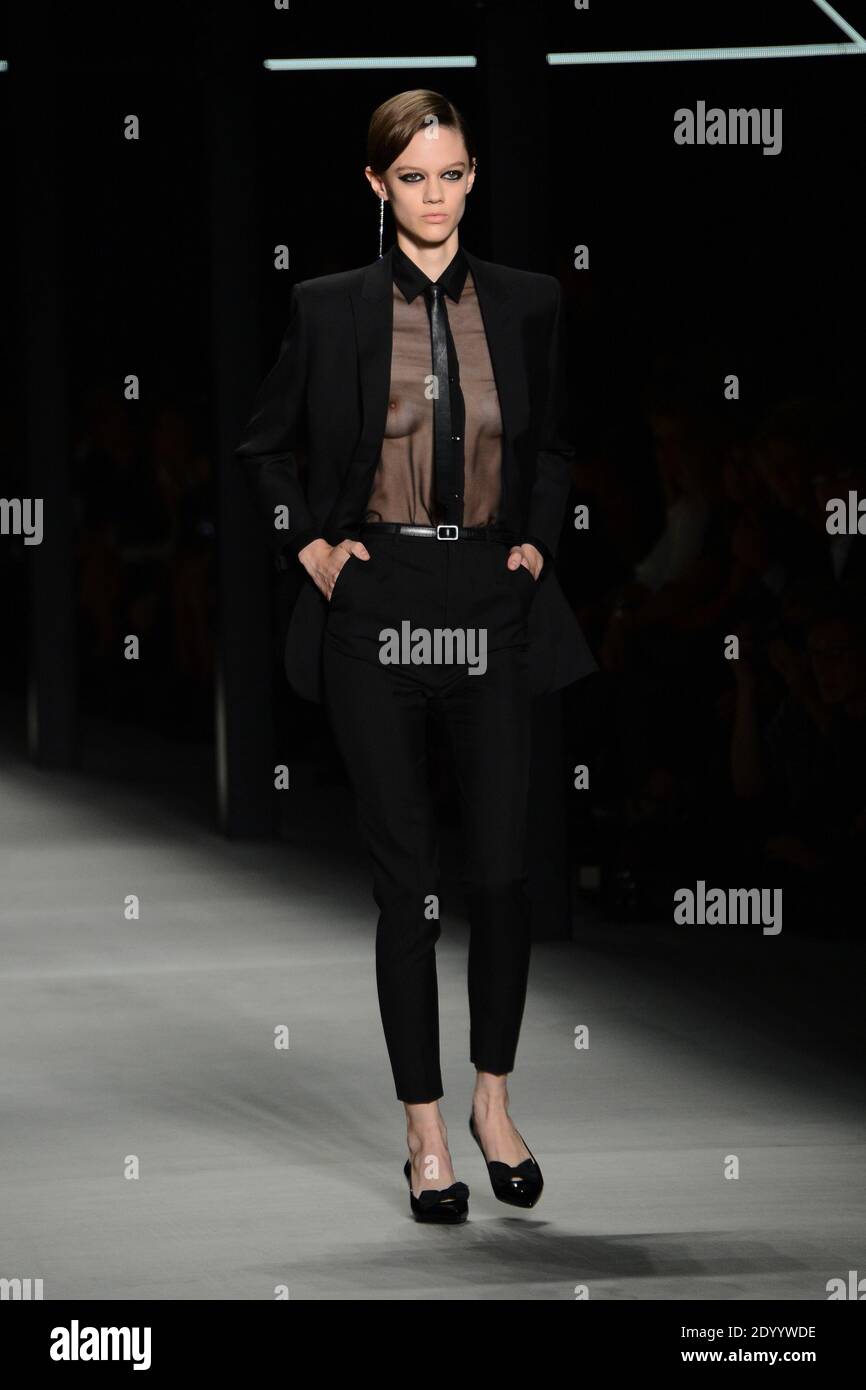 A model displays a creation by designer Hedi Slimane for Saint-Laurent ...