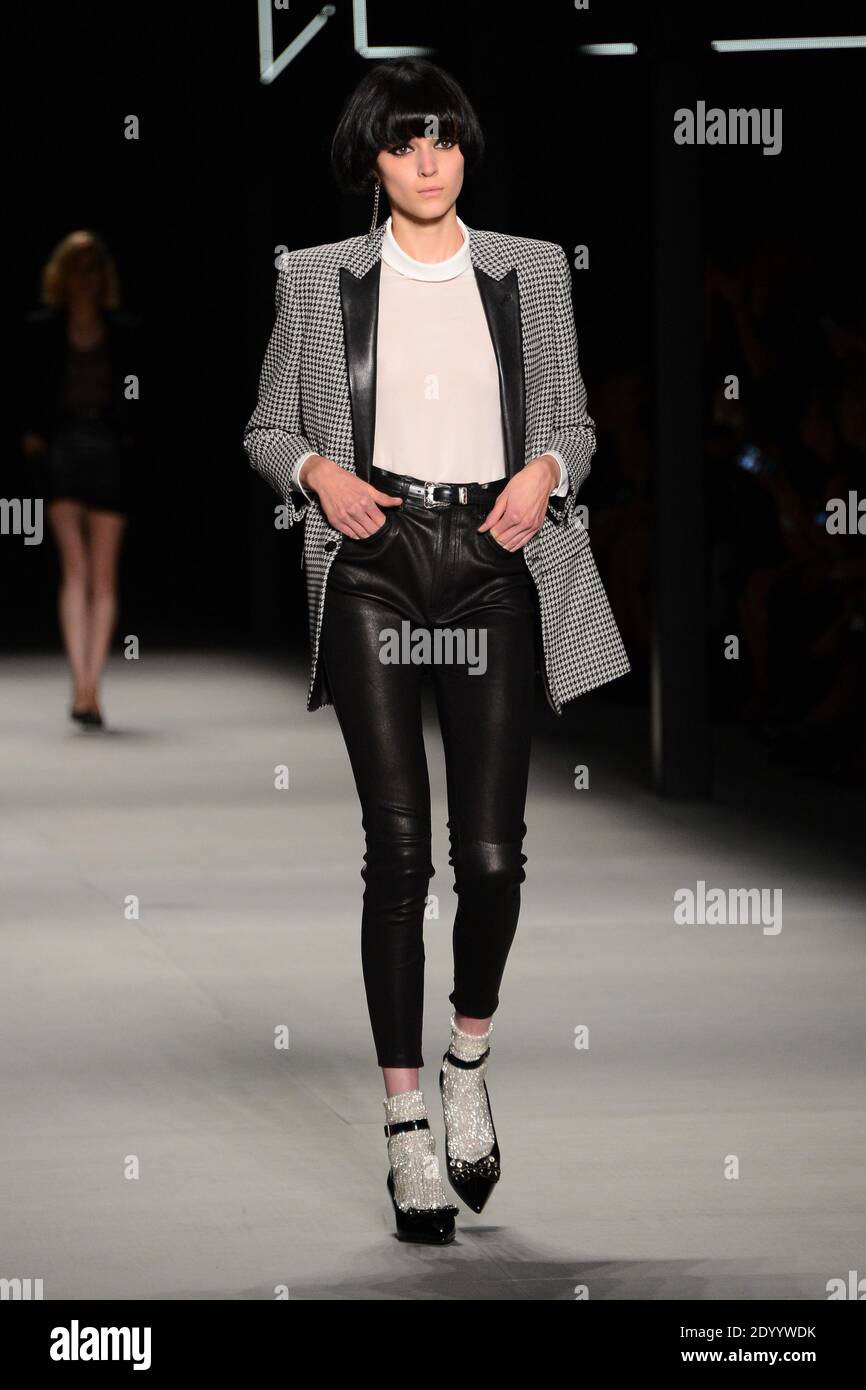 A model displays a creation by designer Hedi Slimane for Saint-Laurent ...