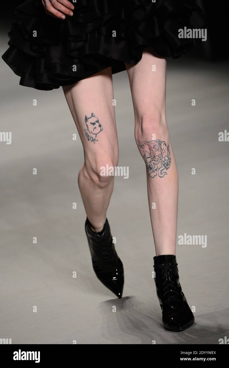 A model displays a creation by designer Hedi Slimane for Saint-Laurent ...