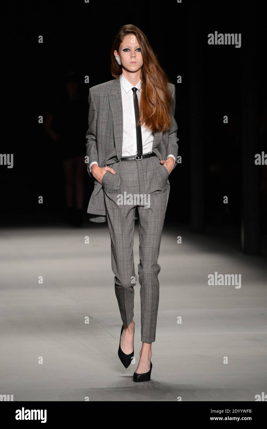 A model displays a creation by designer Hedi Slimane for Saint-Laurent ...