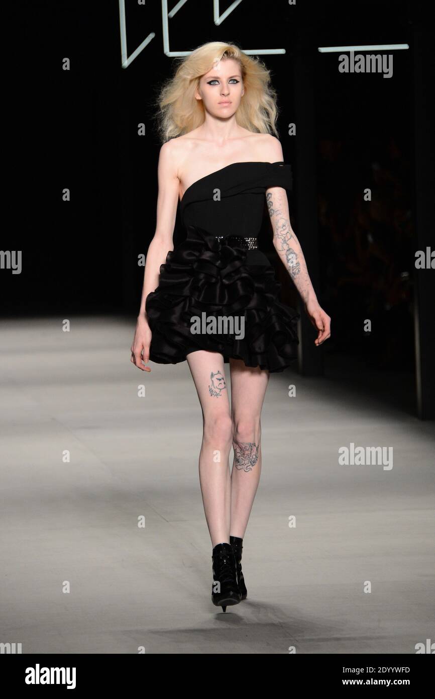 A model displays a creation by designer Hedi Slimane for Saint-Laurent ...